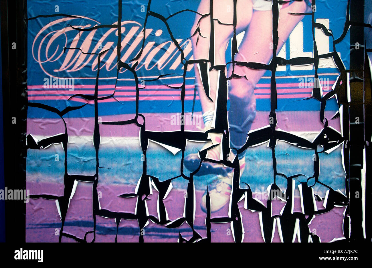 Sun faded display in window of William Hill betting shop Stock Photo ...