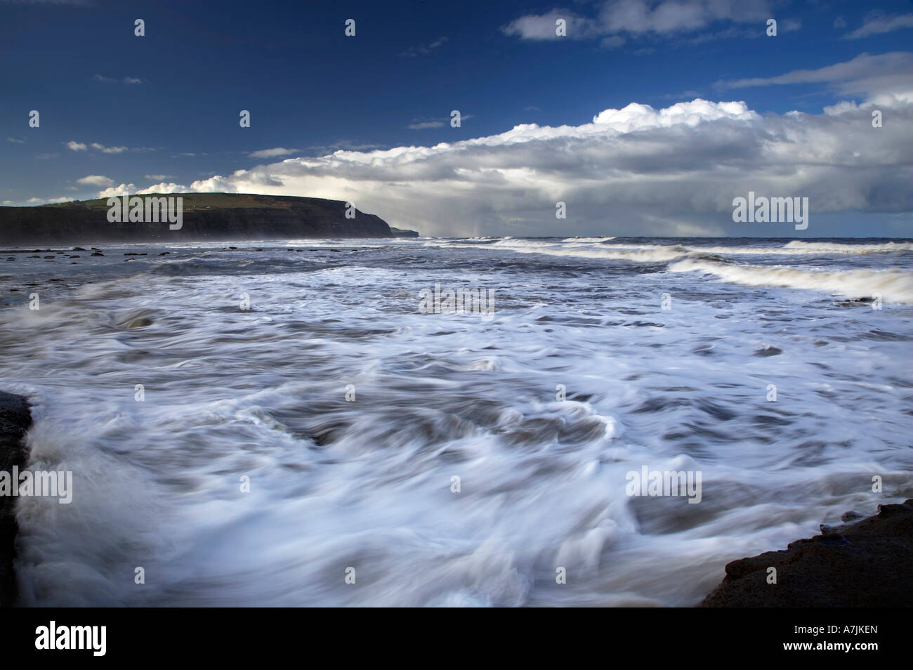 Boulby Cliffs from Staithes with a rough sea running North Yorkshire ...