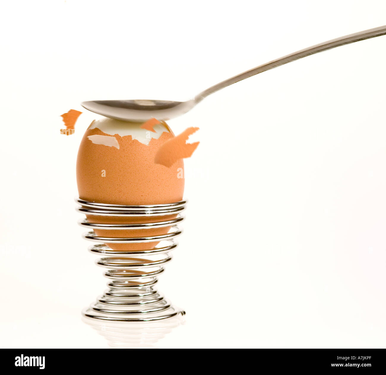 Cracking egg with spoon hi-res stock photography and images - Alamy
