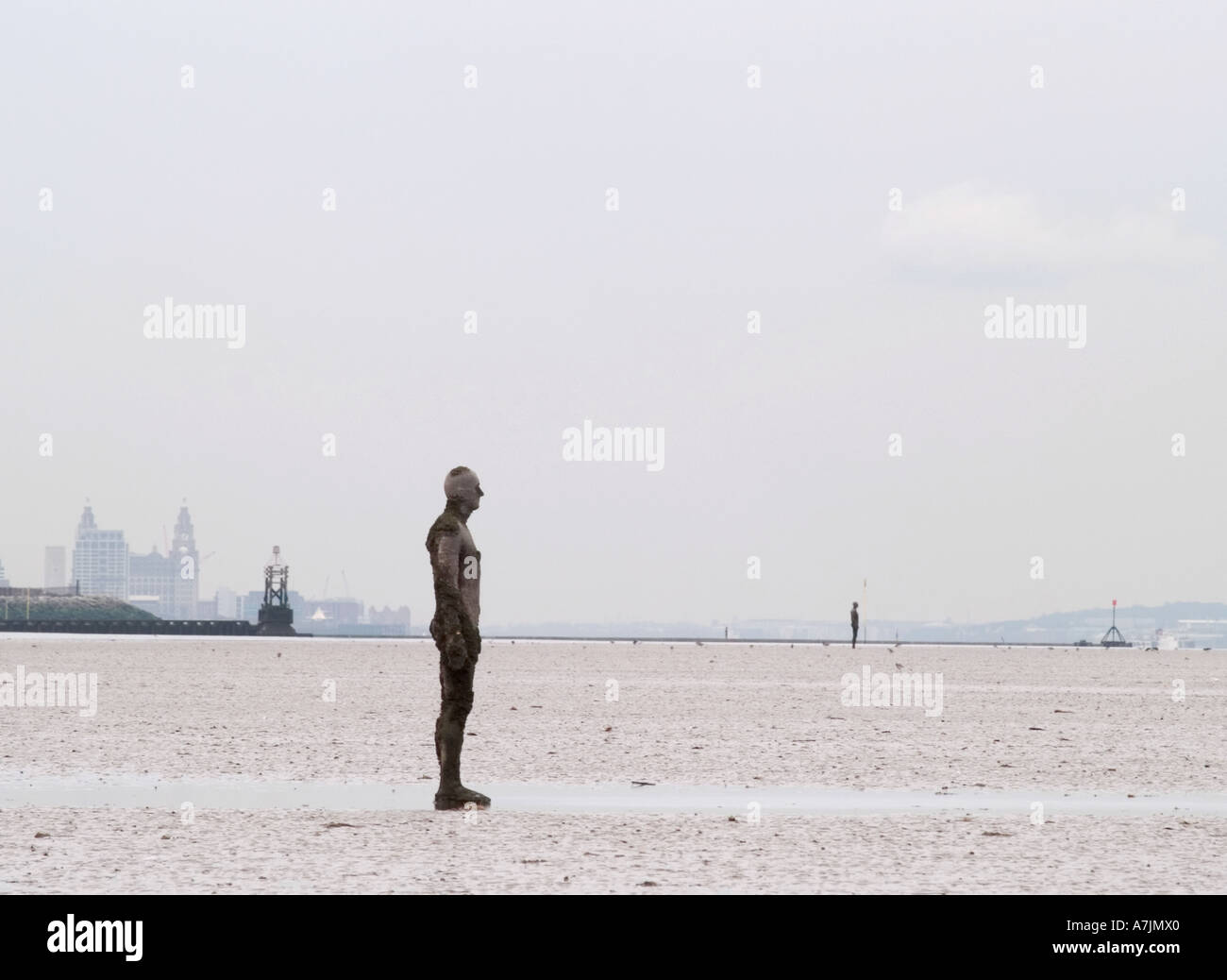 ANTONY GORMLEY SCULPTURED FIGURES ON BEACH AT CROSBY, LIVERPOOL ...