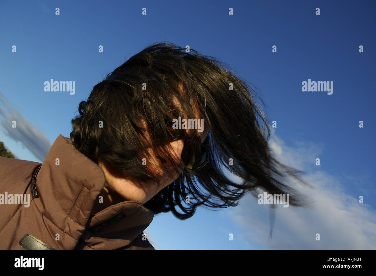 Hair blown in face by wind hi-res stock photography and images - Alamy