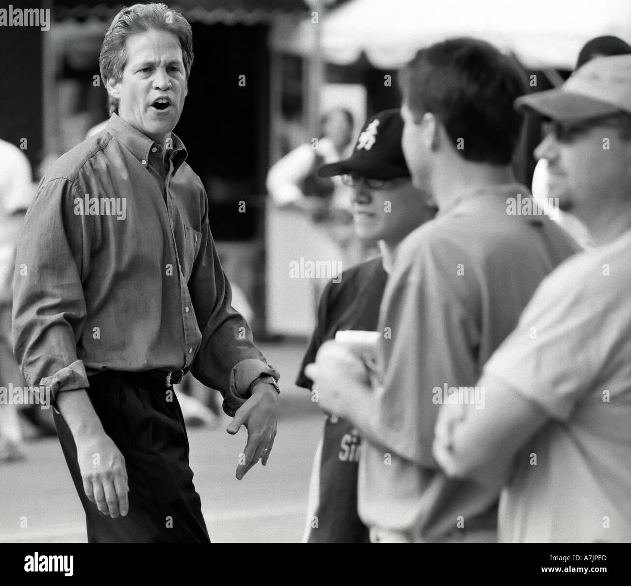 Soon to be US Senator Norm Coleman responds to hecklers as he takes ...