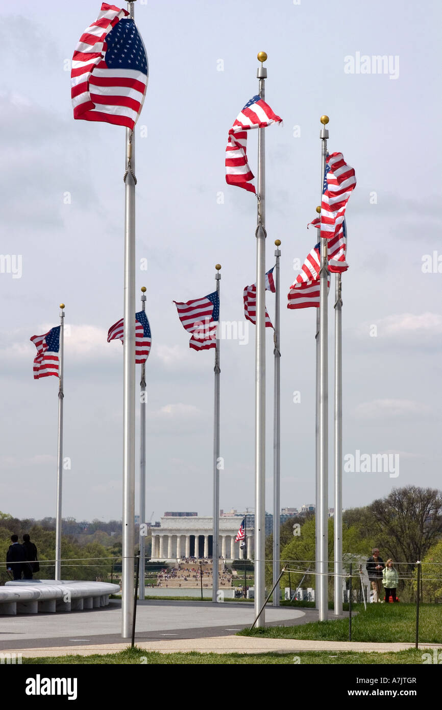 Display of flags at the Washington Monument with the Lincoln Memorial ...