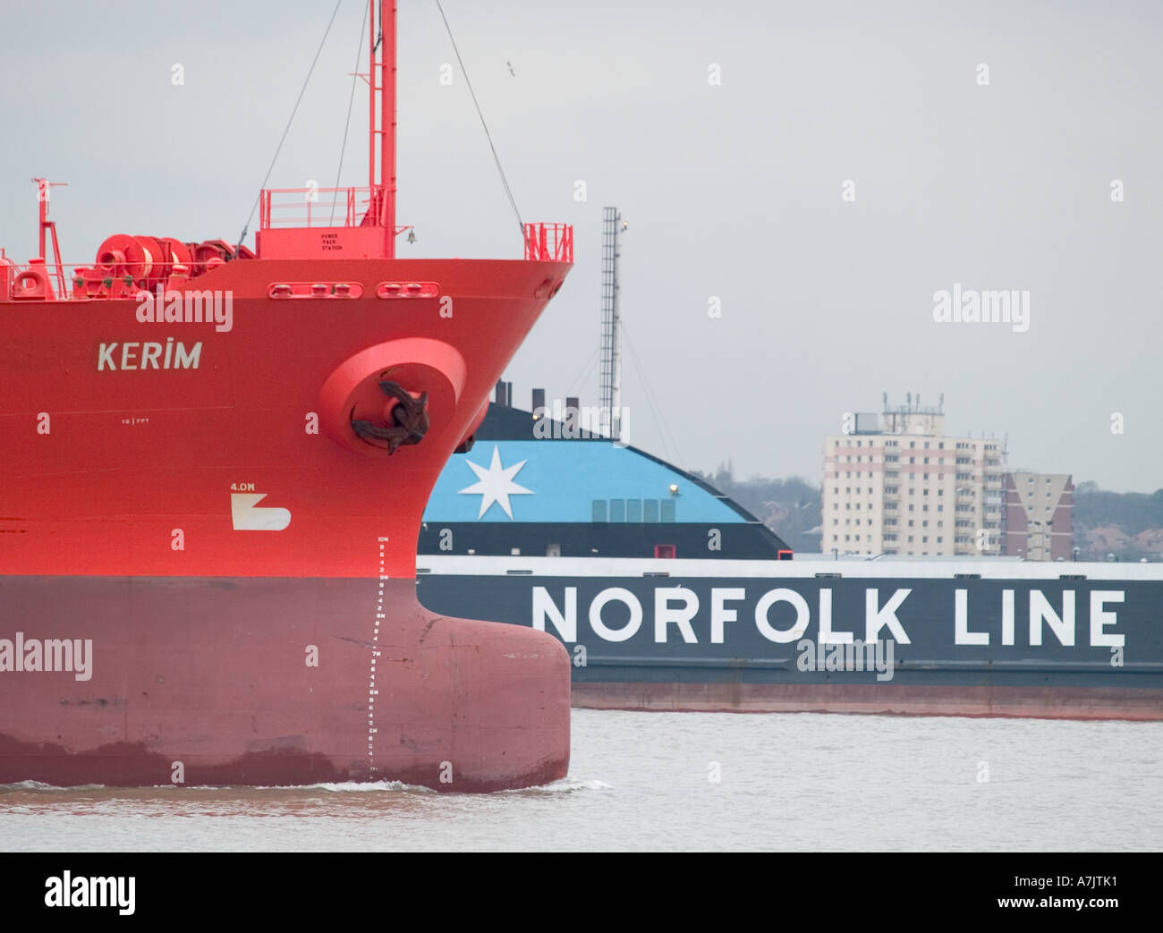 SHIP PASSES A MOORED VESSEL ON THE RIVER MERSEY, LIVERPOOL, MERSEYSIDE ...