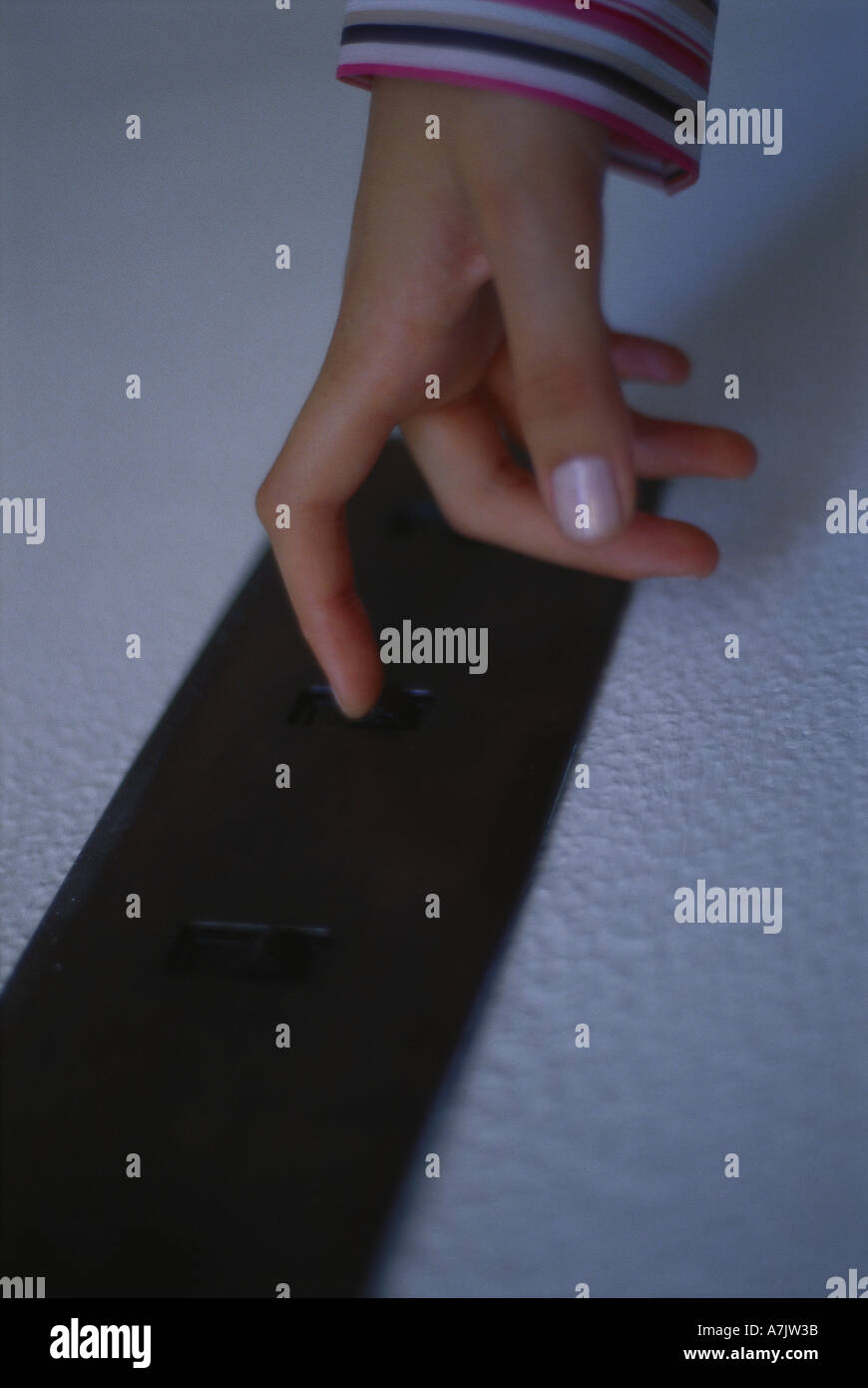 Close up of a woman s hand turning a switch on Stock Photo - Alamy