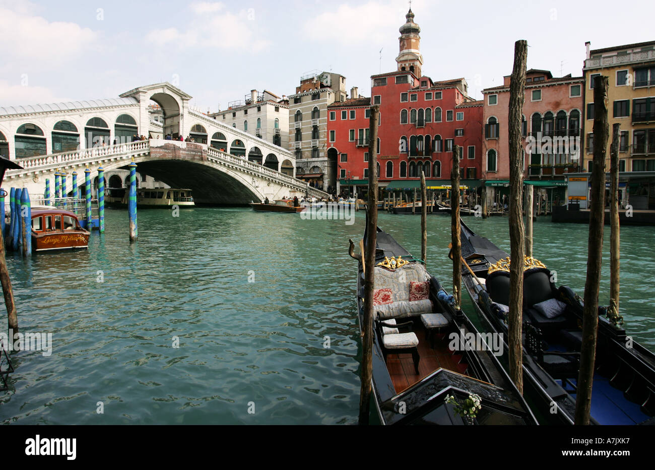 Two Gondola boats on Grand Canal point at famous Rialto Bridge Ponte di ...