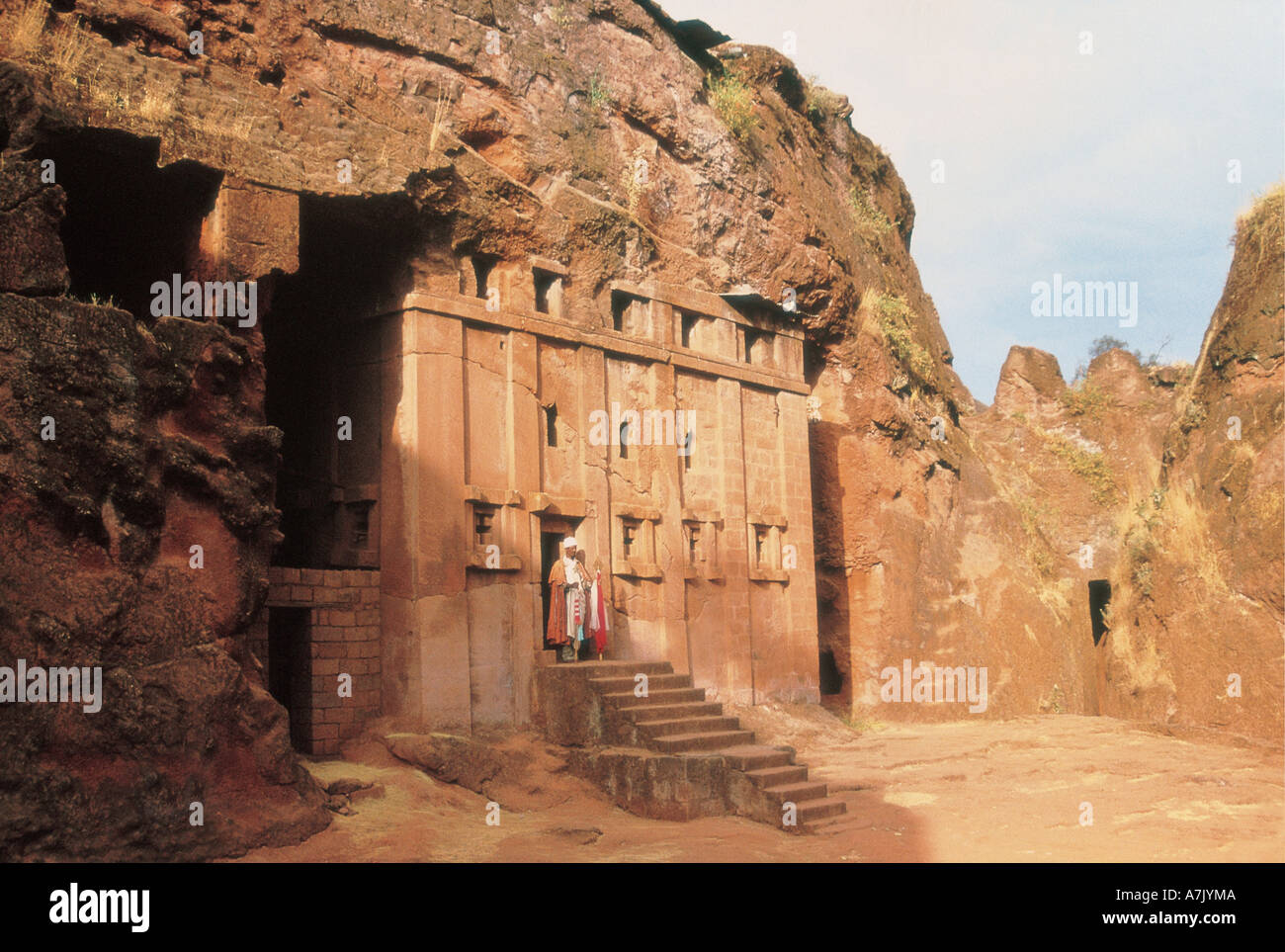 Rock hewn church and priest Lalibela Ethiopia Stock Photo - Alamy