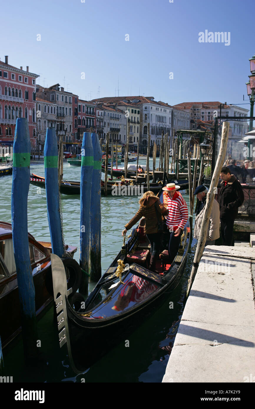 Venetian local gondola man wearing traditional striped uniform and ...