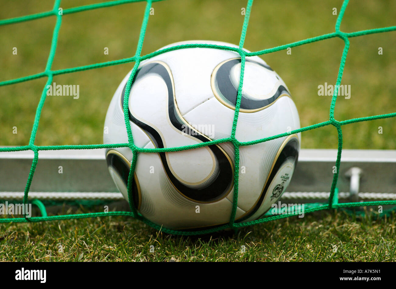 football in goal net Stock Photo - Alamy