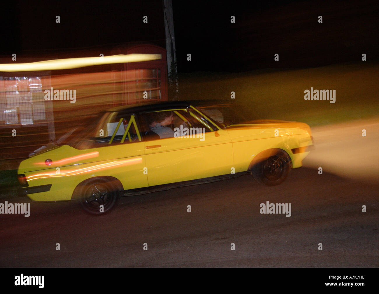 yellow rally car Stock Photo - Alamy