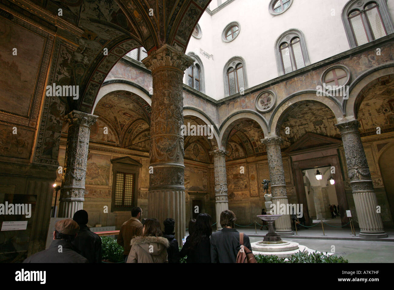 Tourists view Michelozzos open air internal courtyard inside the famous ...