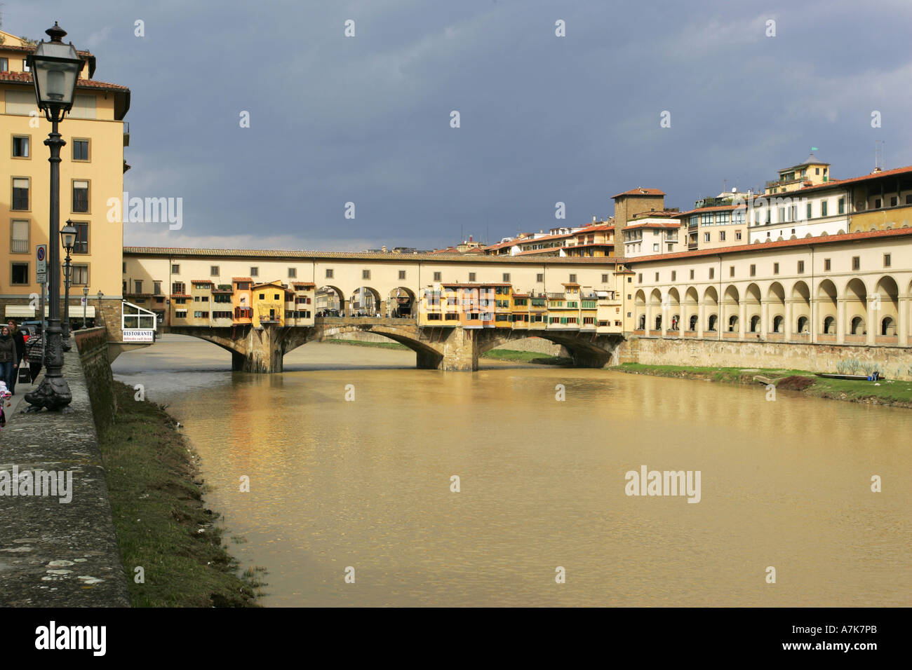 World famous bridge the Ponte Vecchio spans the Arnot river in Florence ...