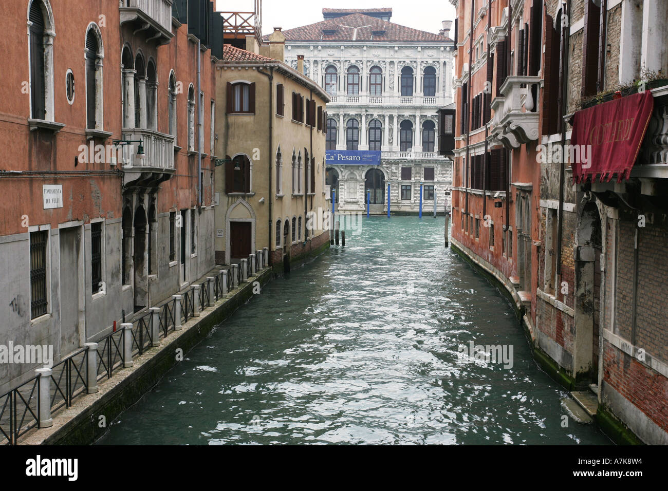 Typical Venetian buildings line a small backwater inlet from the famous ...