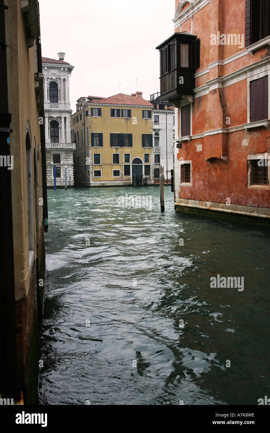 Typical Venetian buildings line a small backwater inlet from the famous ...