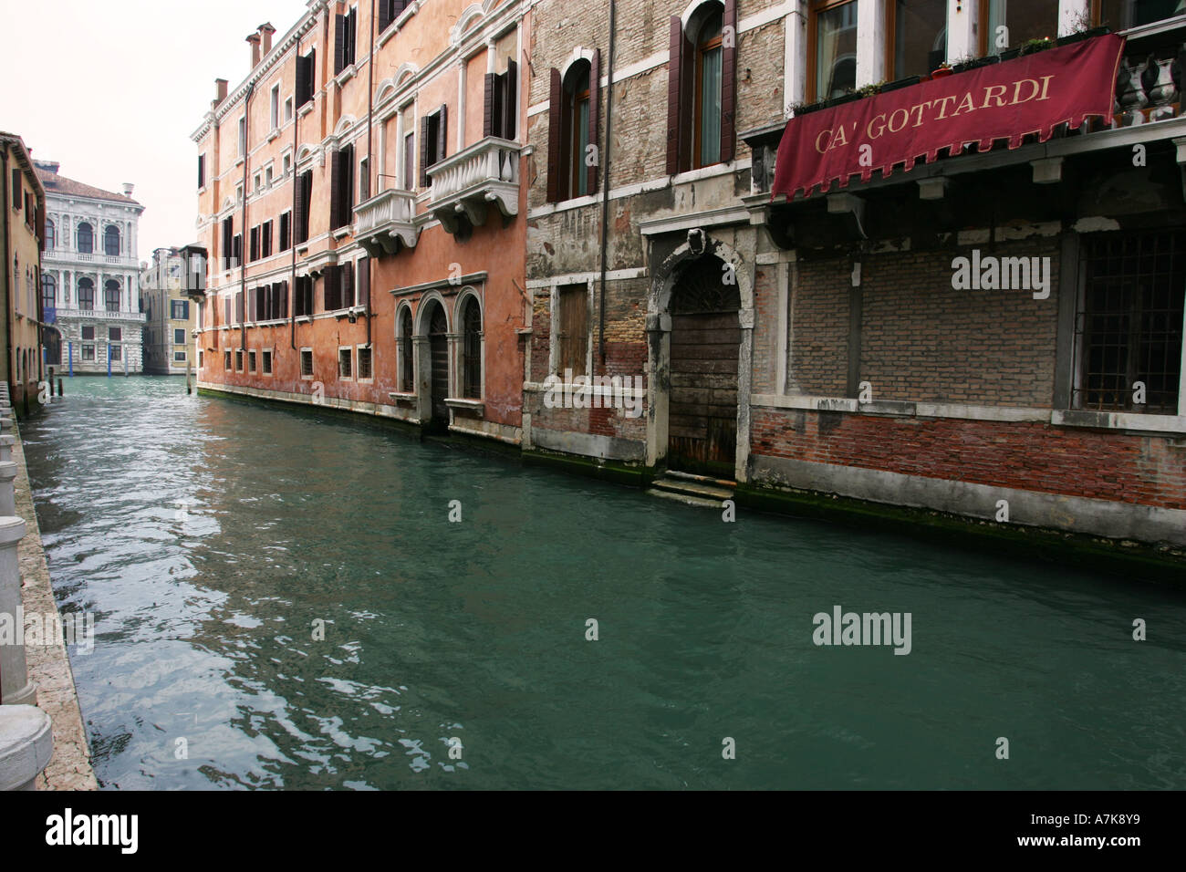 Typical Venetian buildings line a small backwater inlet from the famous ...