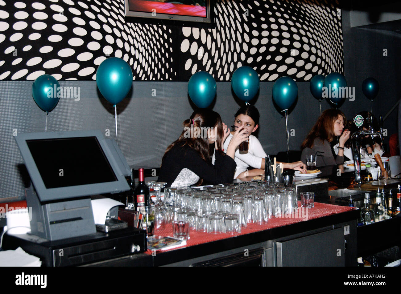 two teen girls at a bar, Tel Aviv Israel Stock Photo - Alamy