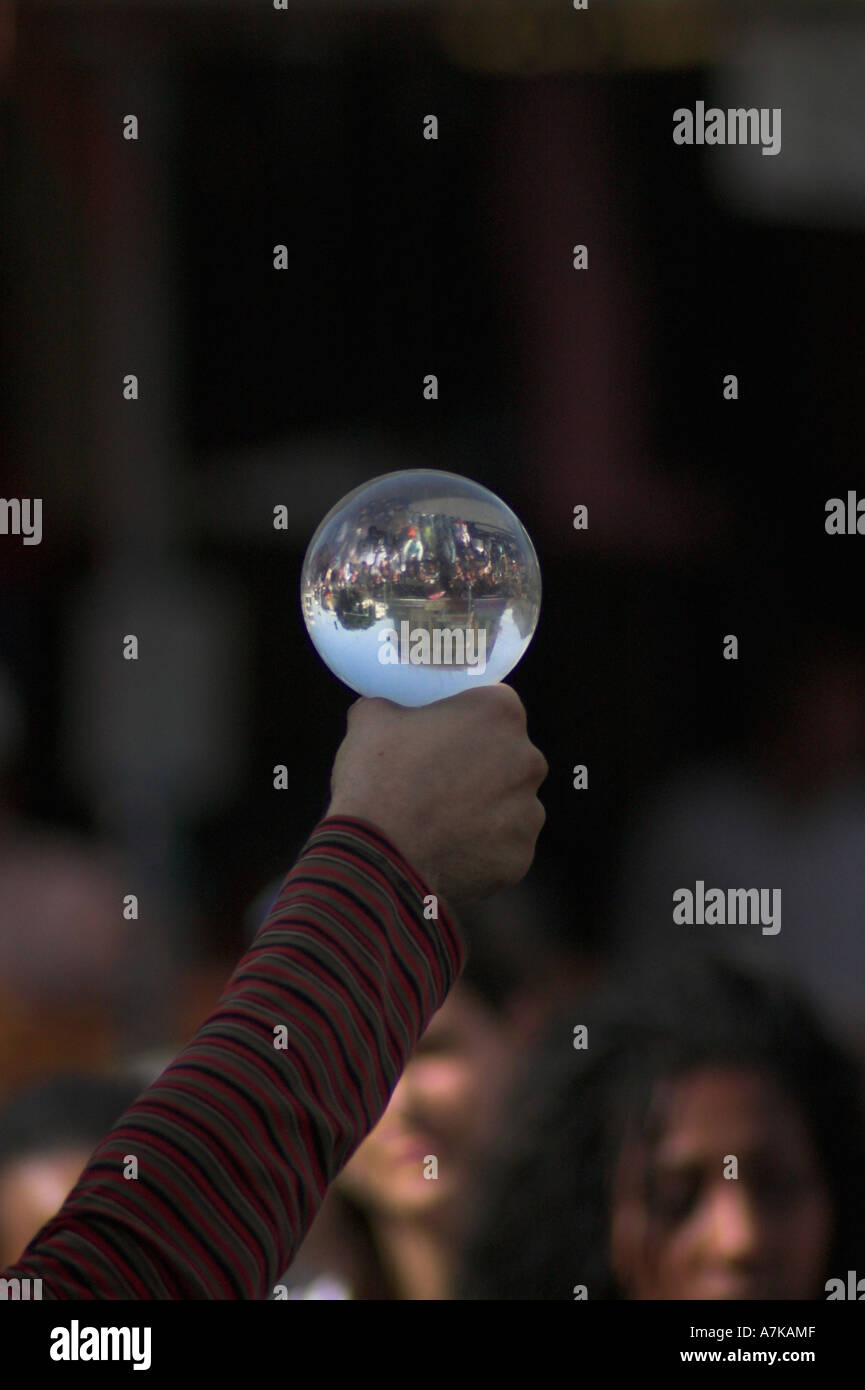 Street Juggler Contact Juggling with a crystal ball Stock Photo - Alamy
