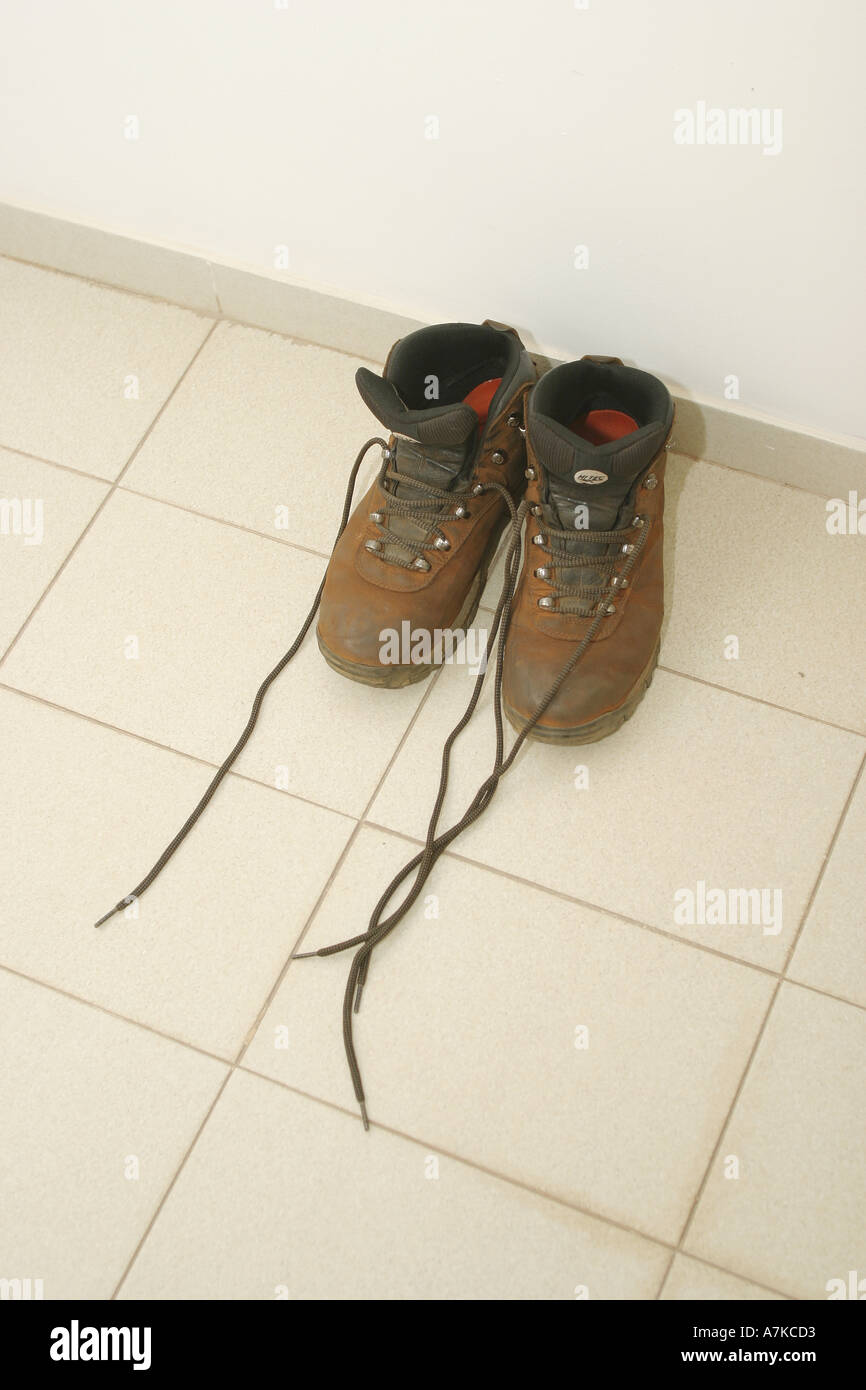 Laces untied pair boots hi-res stock photography and images - Alamy