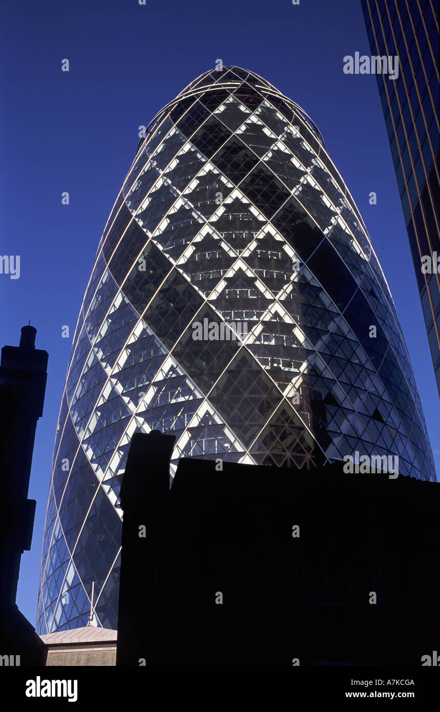 The Gherkin (AKA 30 St Mary Axe or formerly Swiss Re building) with ...