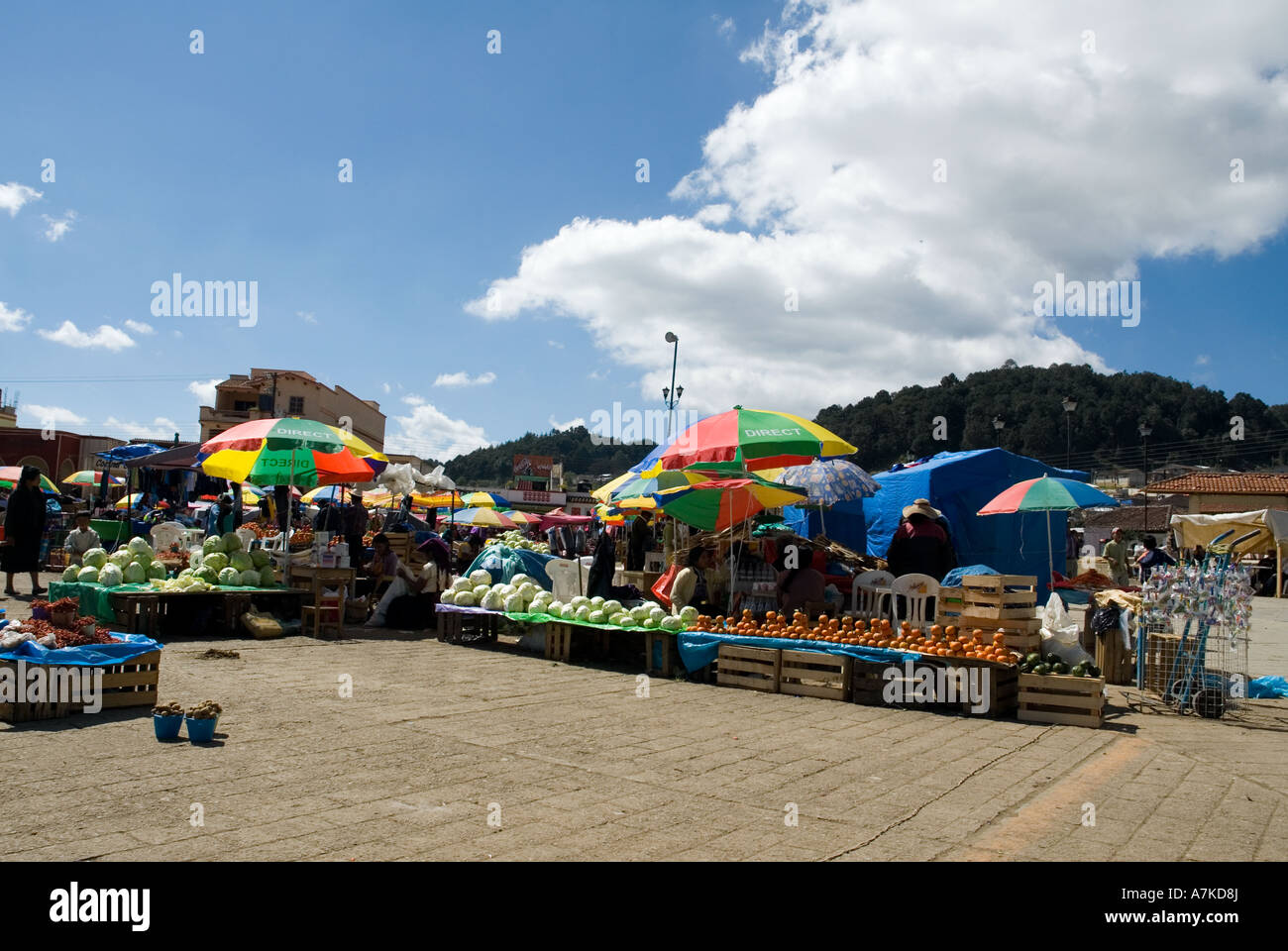 San Juan Chamula market of fruits - women under umbrella - Chiapas ...