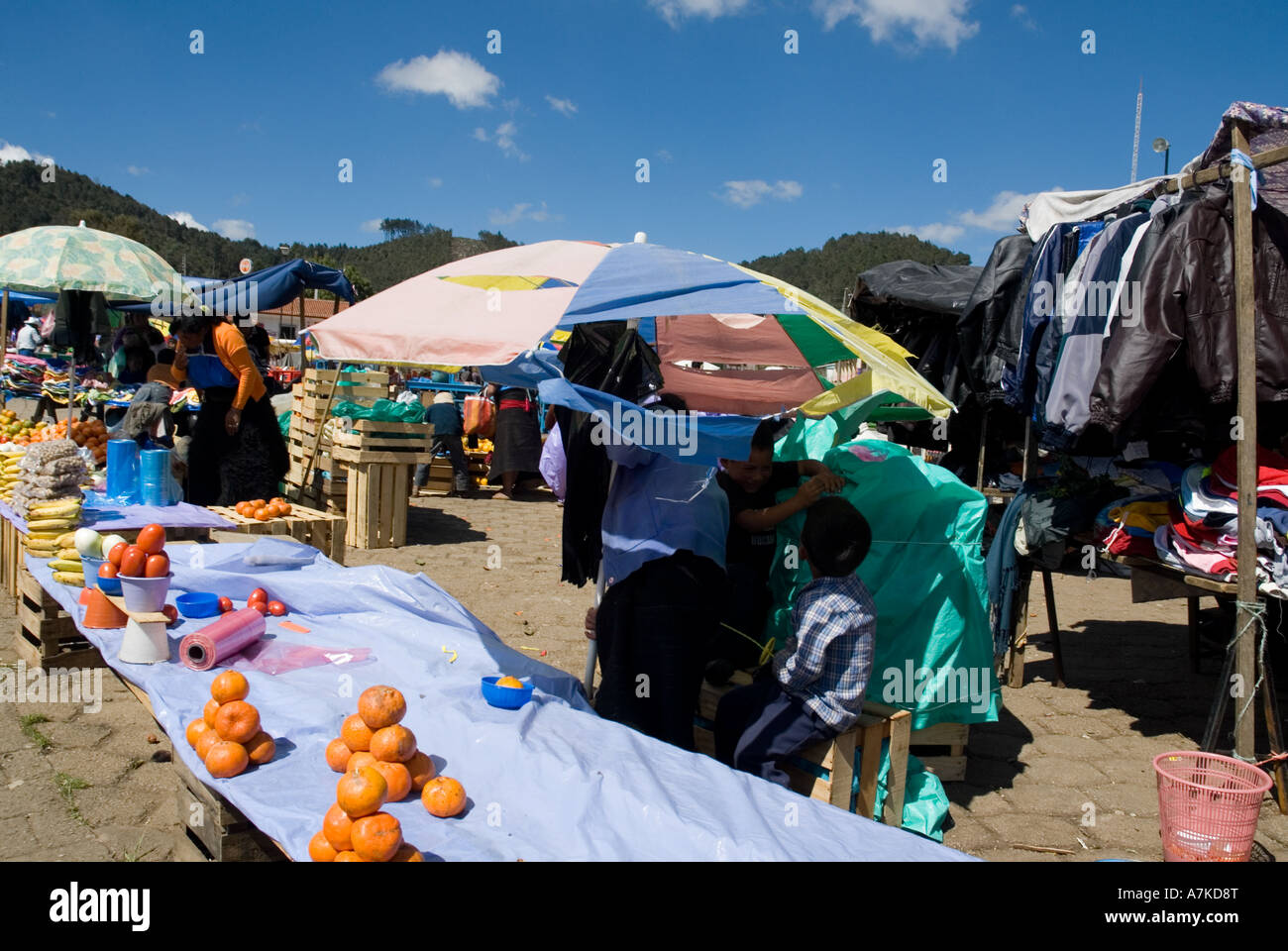 San Juan Chamula market of fruits - women under umbrella - Chiapas ...