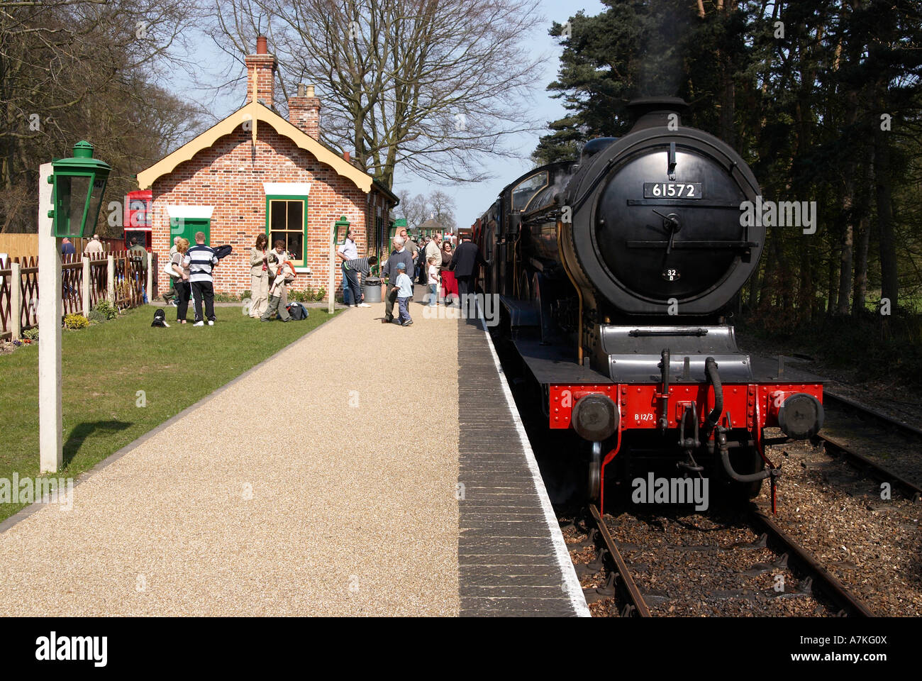 B12 class steam locomotive and train train at Holt station on the North ...