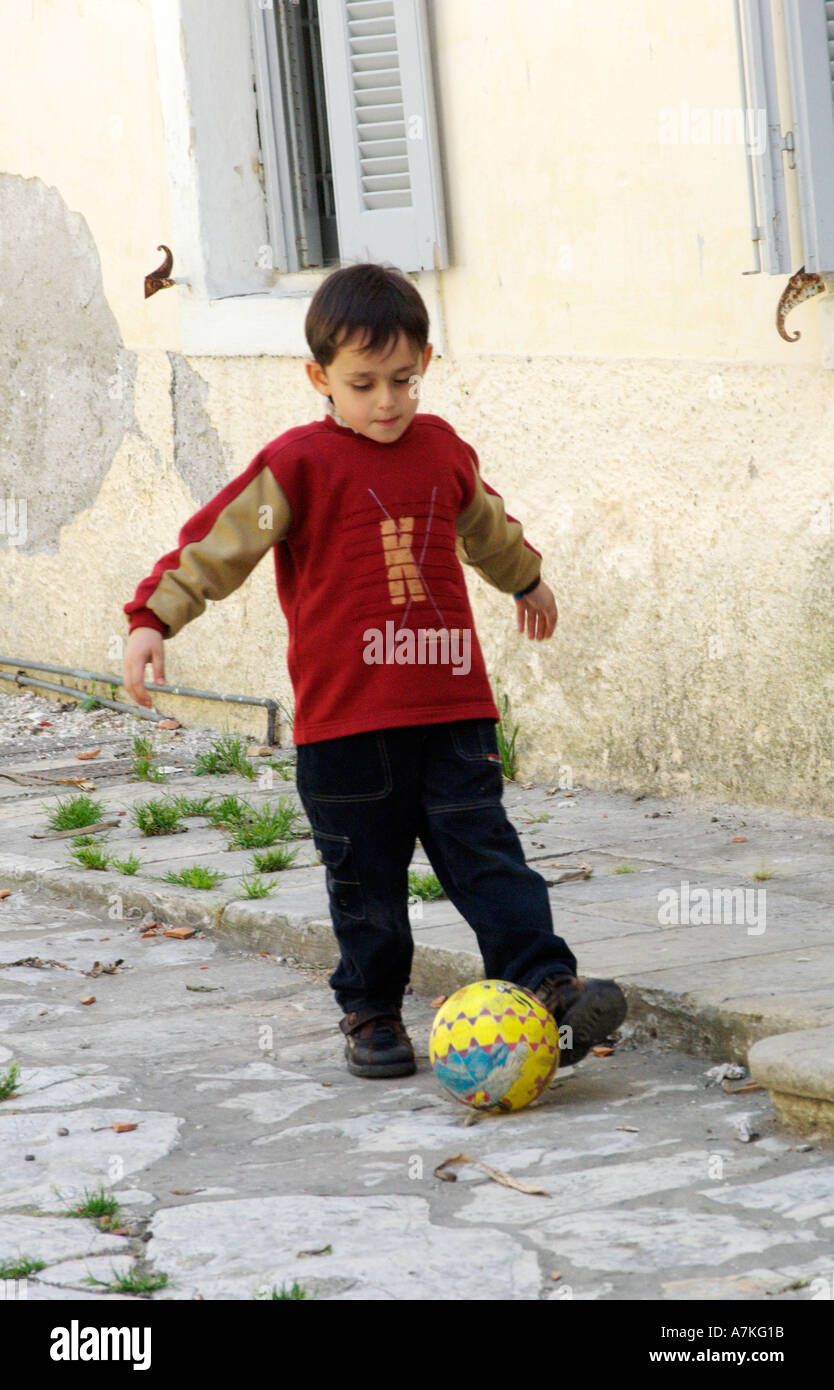 Corfu Young Footballer in Corfu Old Town Stock Photo - Alamy