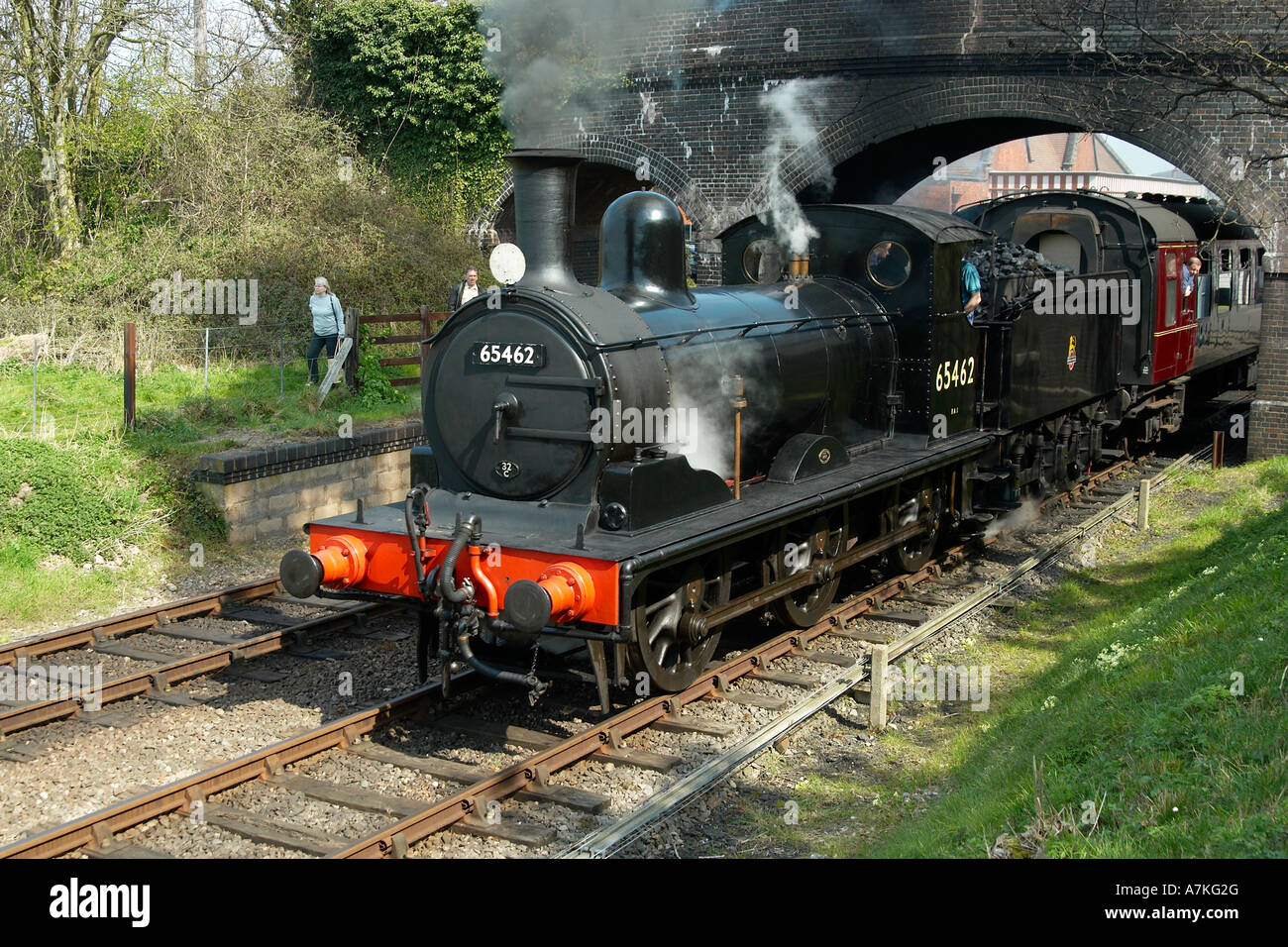 Steam train hauled by J15 class engine leaving Weybourne Station, North ...