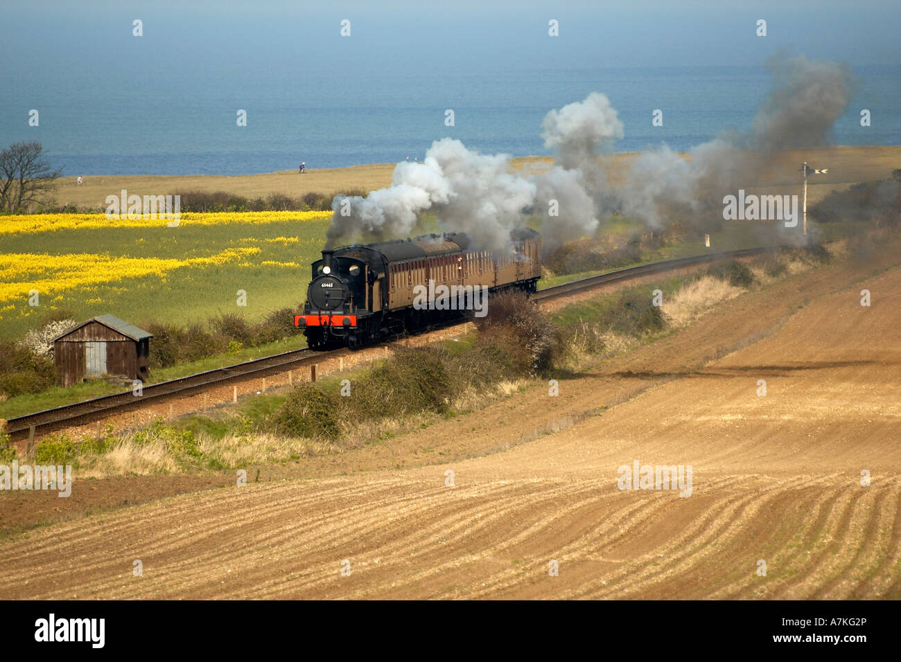 Steam train hauled by J15 class engine approaching Weybourne on the ...