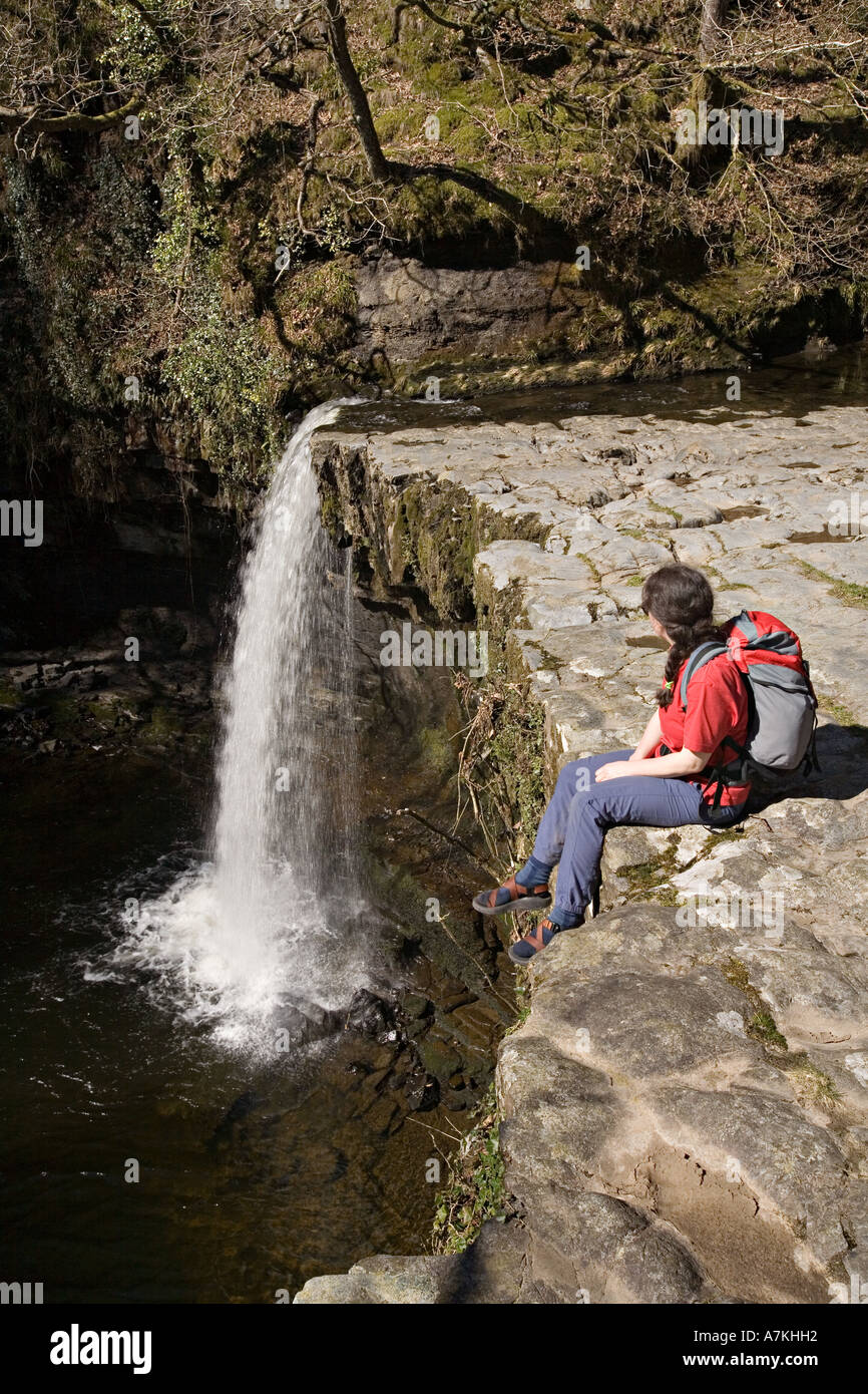 Female hiker sitting waterfall hi-res stock photography and images - Alamy