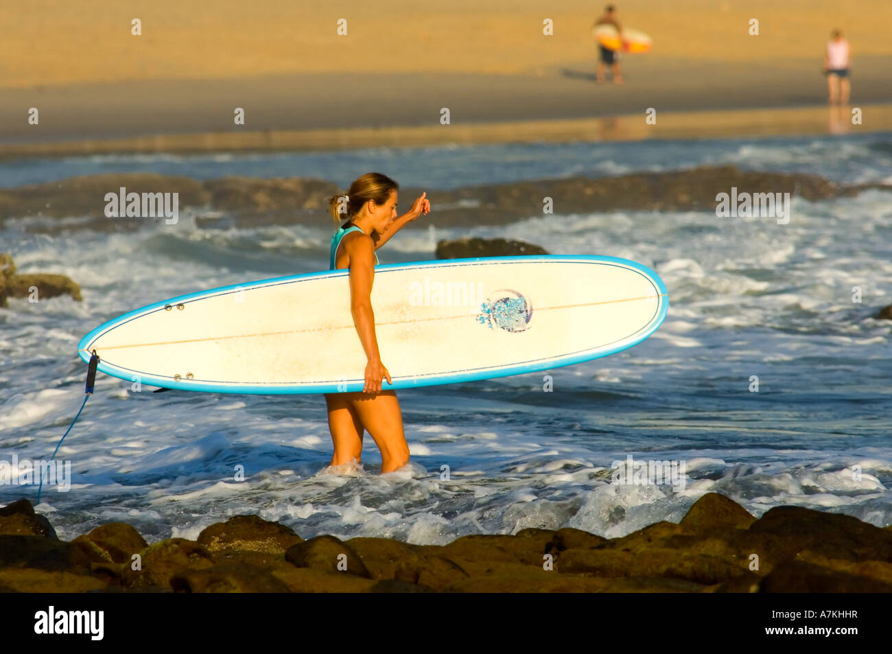 Female longboard surfer Stock Photo - Alamy