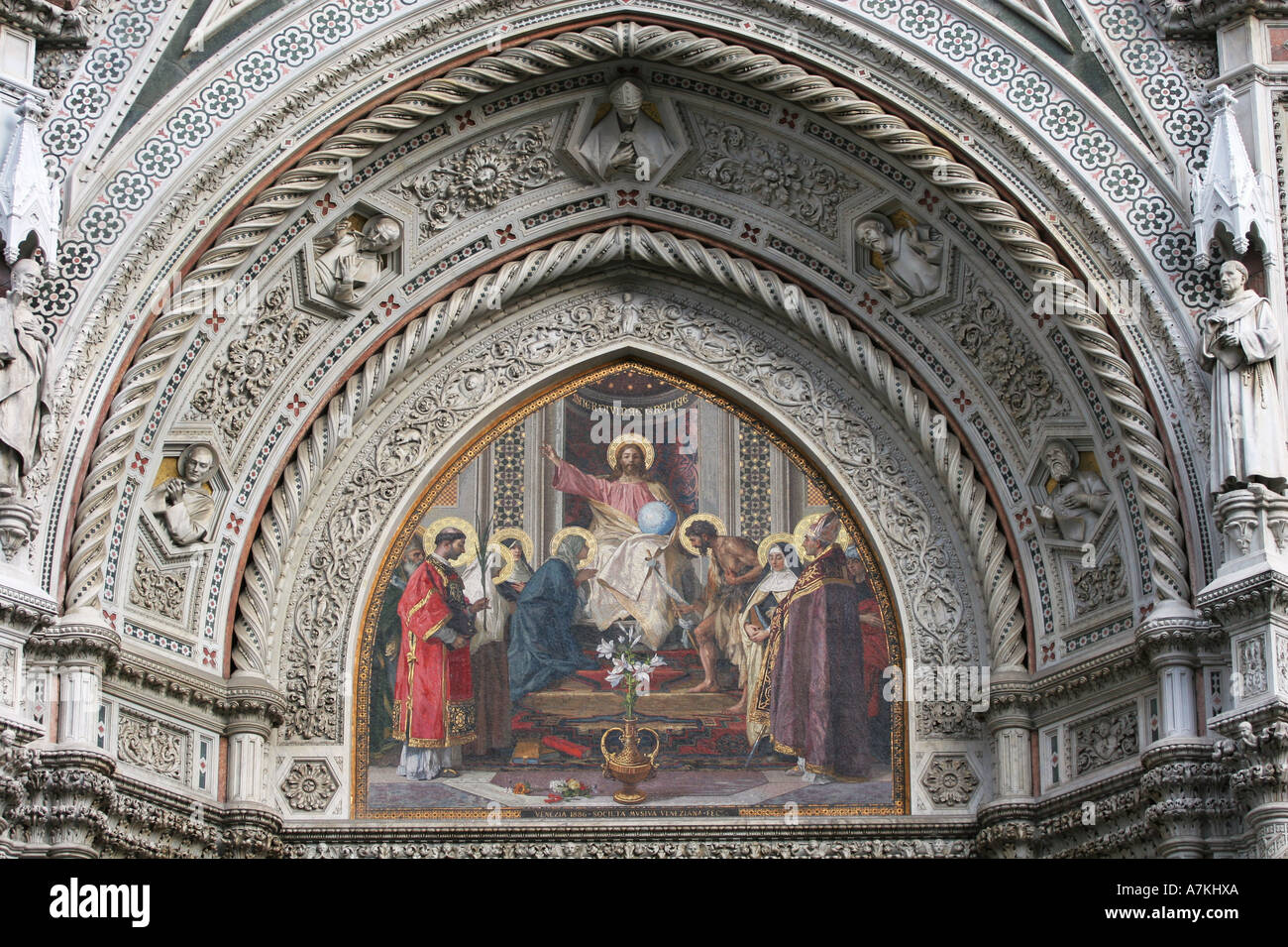 Colourful fresco paintings above the famous bronze doorways of the ...