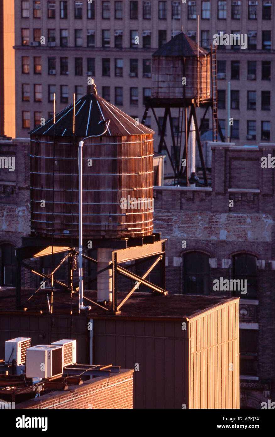 Water storage tank on top of a New York City building Stock Photo - Alamy