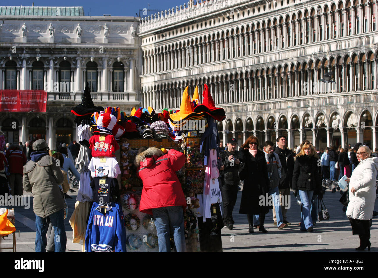 Italian street vendors prepare their tourist souvenir stall with Saint ...