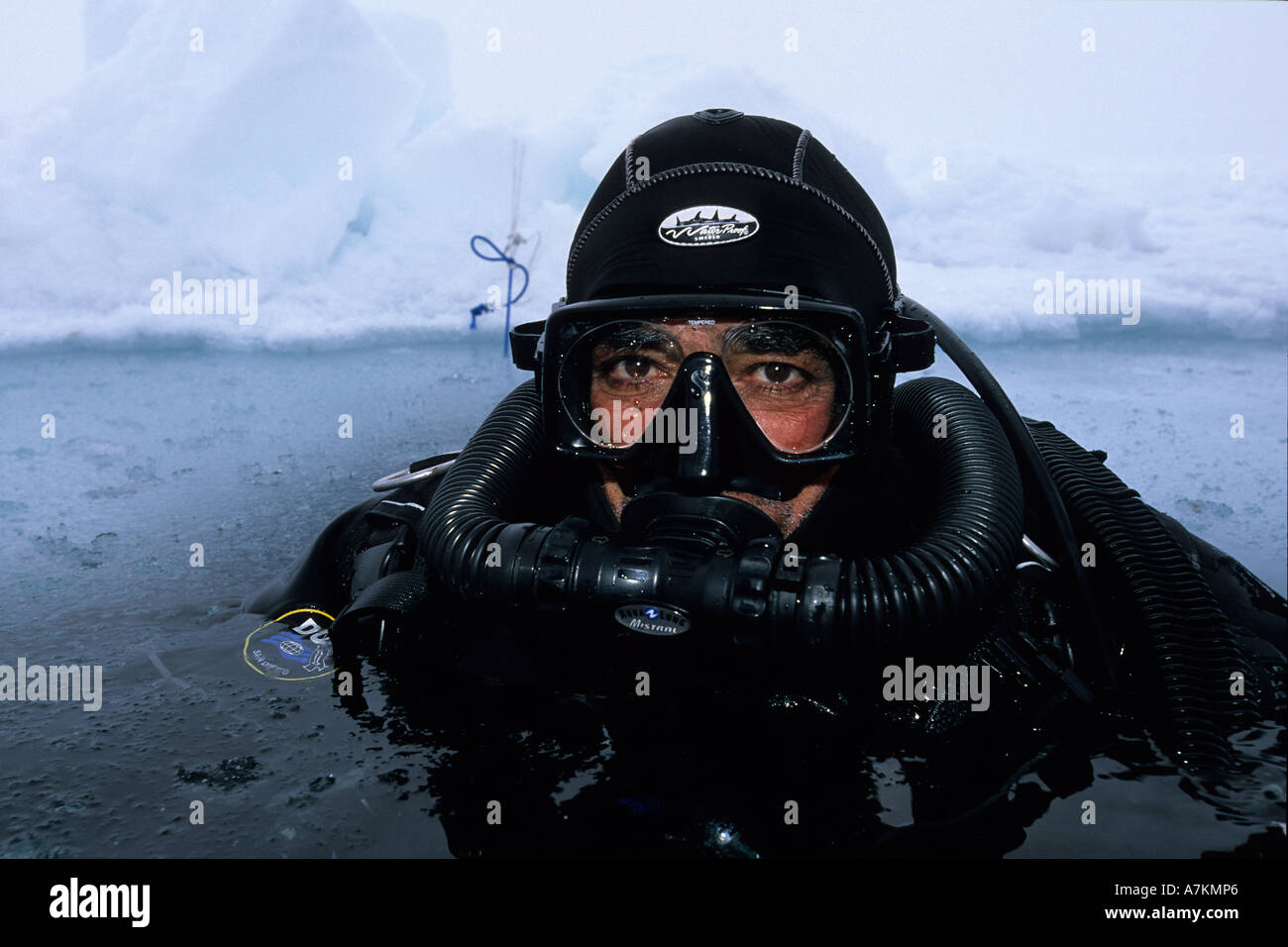 underwater photographer ready to dive under the ice Canada Arctic ...