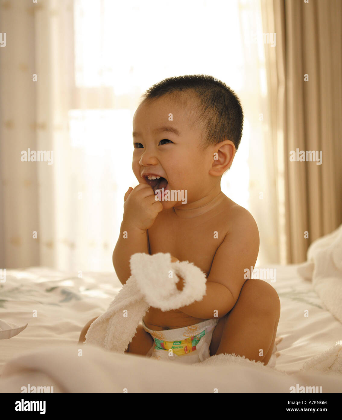 portrait of a chinese baby boy smiling at camera Stock Photo - Alamy
