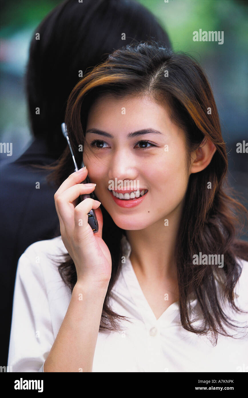 Woman happily talking on phone hi-res stock photography and images - Alamy