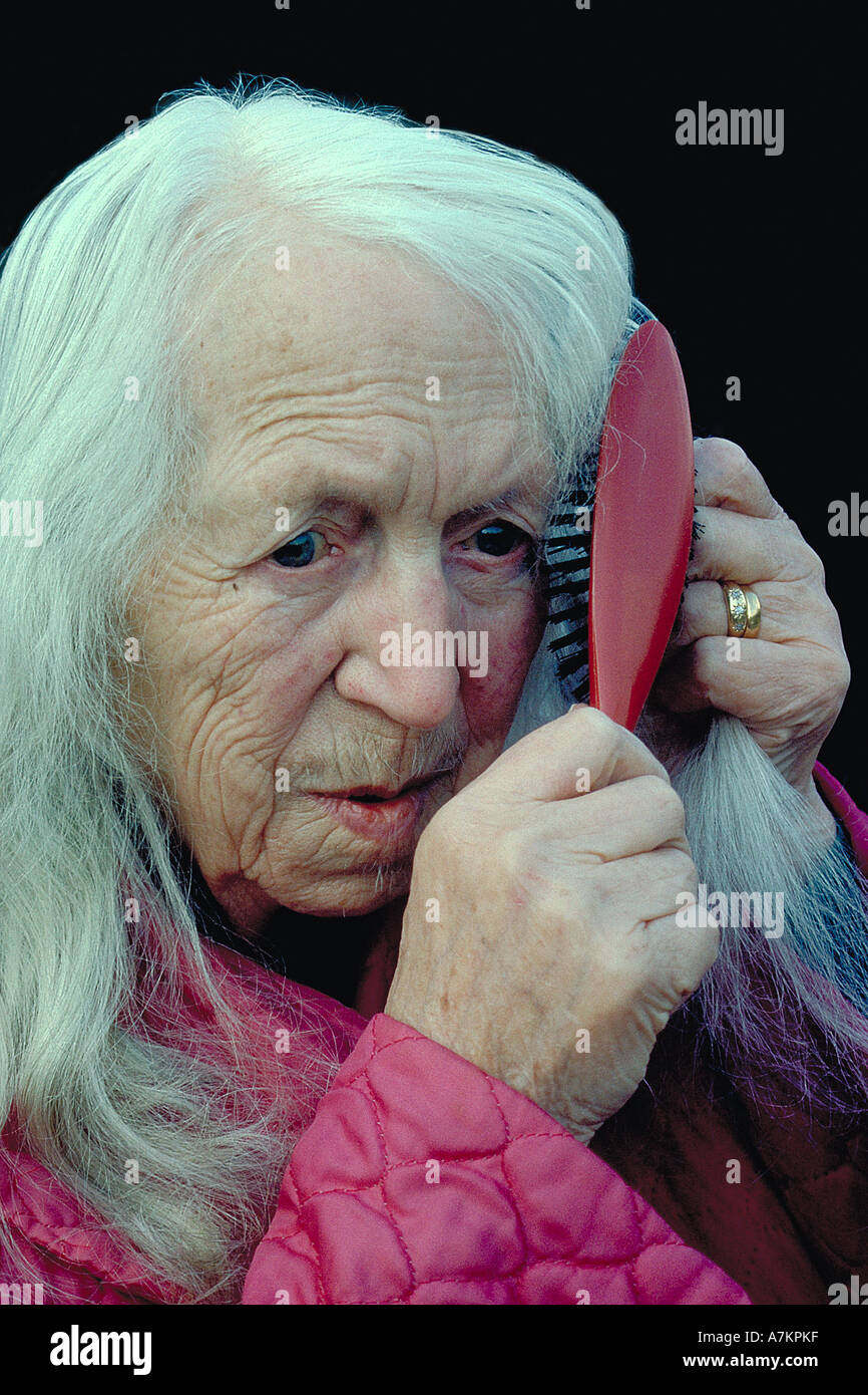 Old lady grooming Stock Photo - Alamy