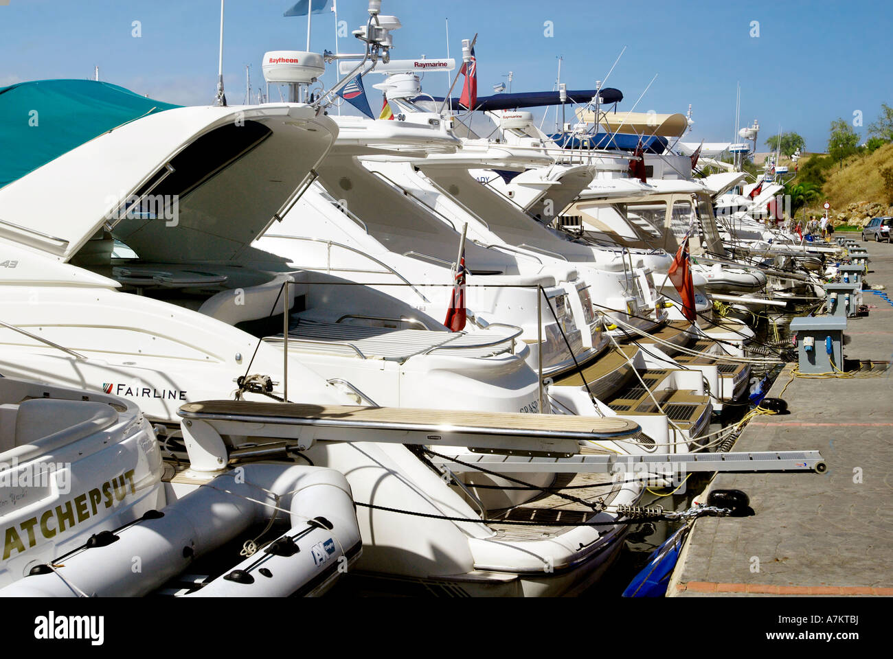 Luxury powerboats in Cala D'Or marina on the island of Mallorca in the ...