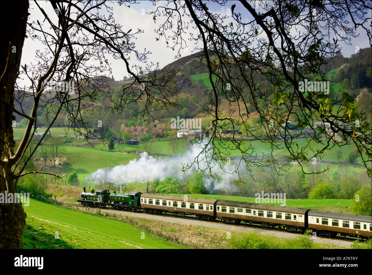 Two tank engines haul a train on the Llangollen heritage railway as it ...