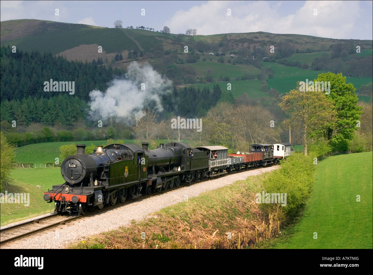 A steam hauled goods train pictured on the Llangollen heritage railway ...