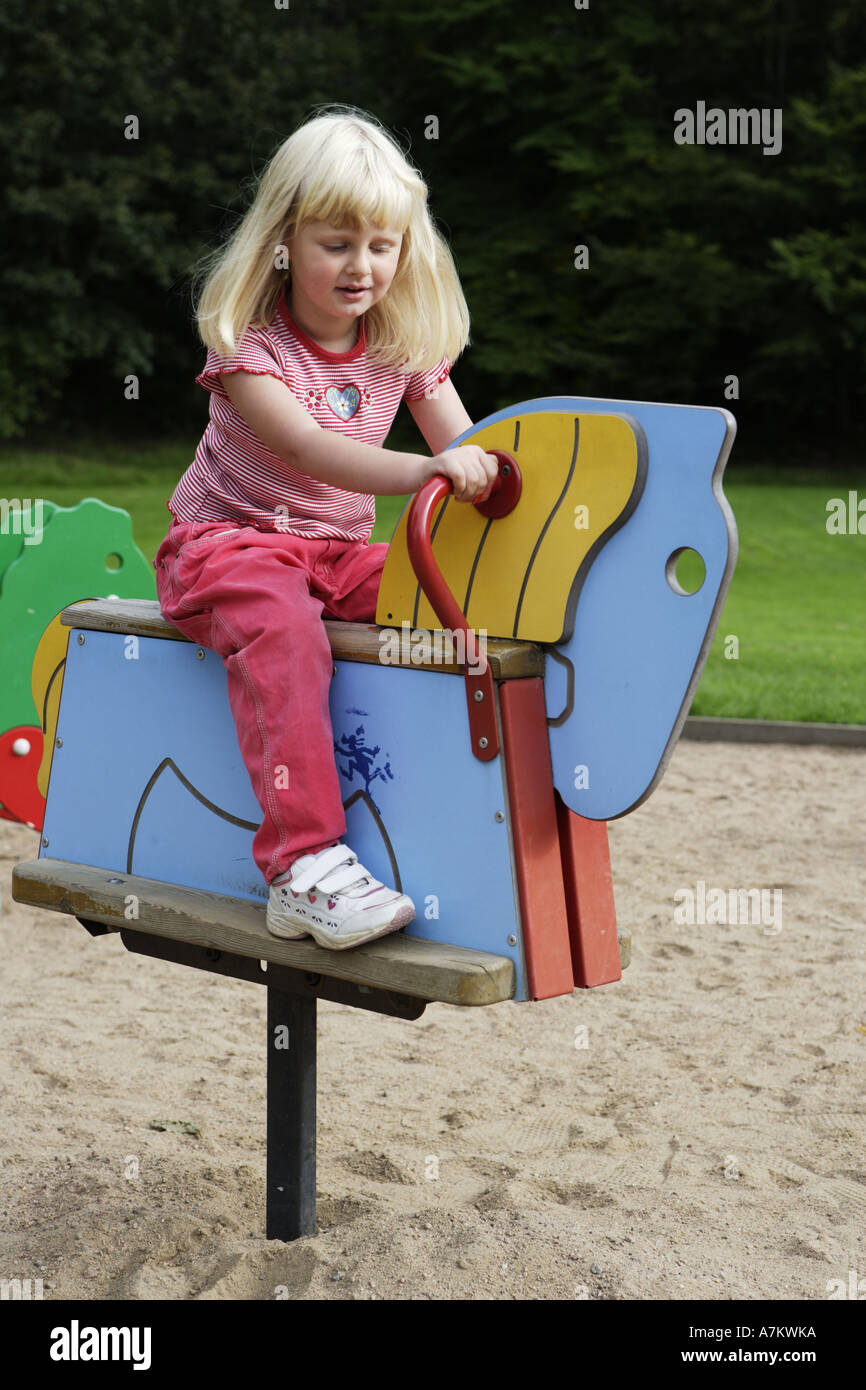 Child in playground Stock Photo - Alamy