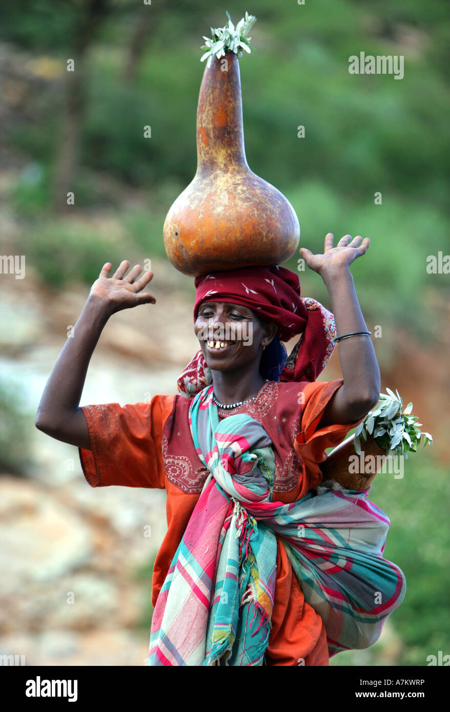 Ethiopia - Woman with calabash on the head in which she transports milk ...