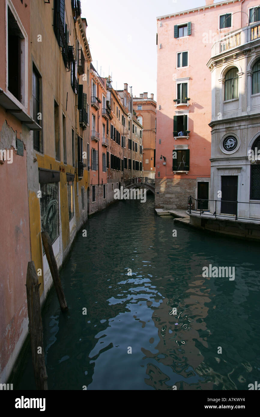Colourful typical buildings tower above an iconic Venice backwater ...