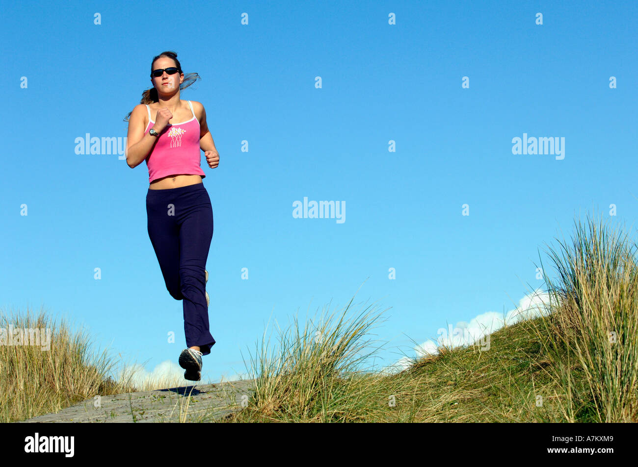healthy young woman jogging keeping fit Stock Photo - Alamy