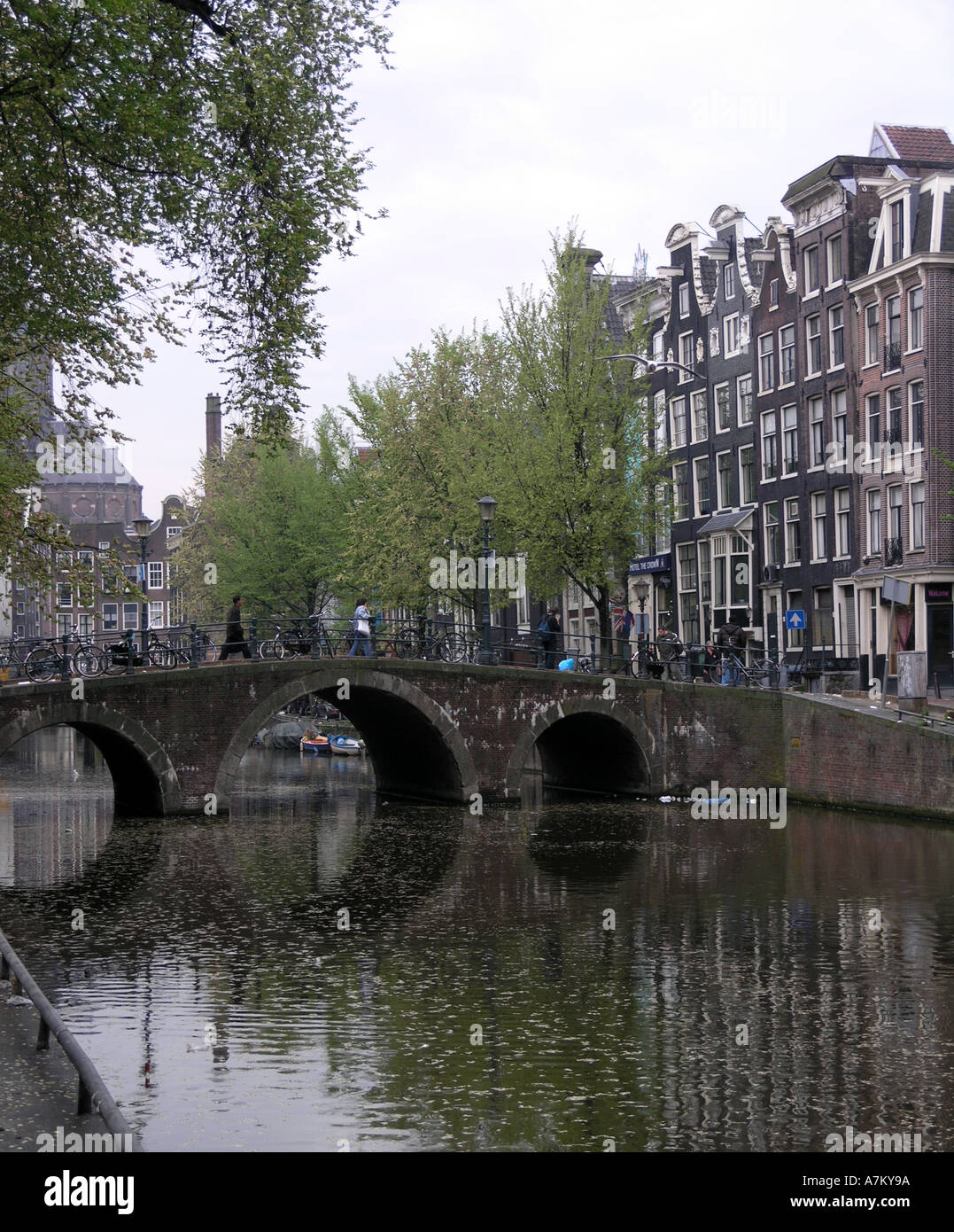 Canal and canal bridge in Amsterdam Stock Photo - Alamy