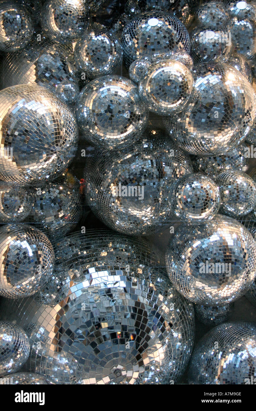 Glitter balls. Shop window display Stock Photo - Alamy