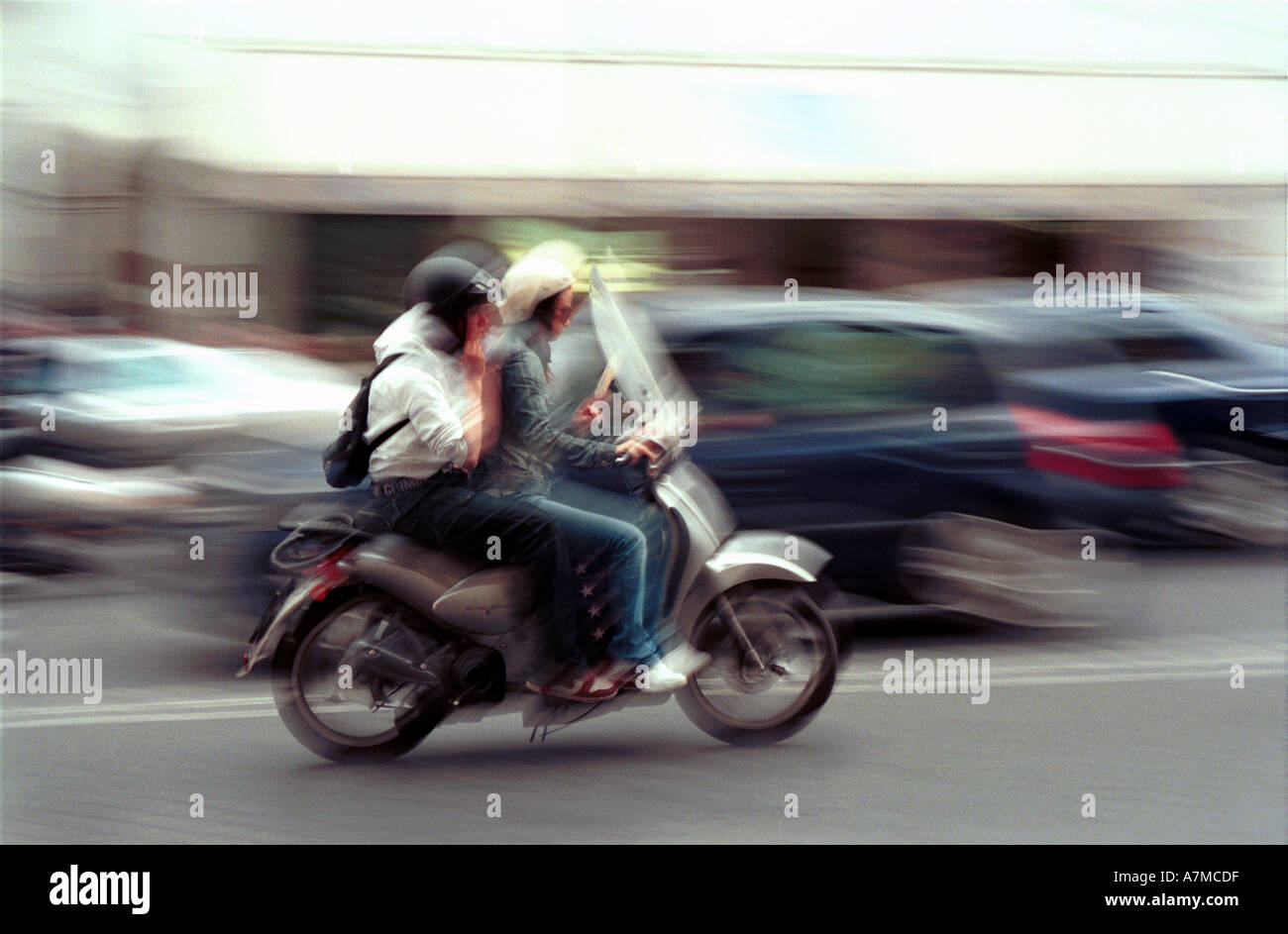 scooters speeding by Rome Stock Photo - Alamy