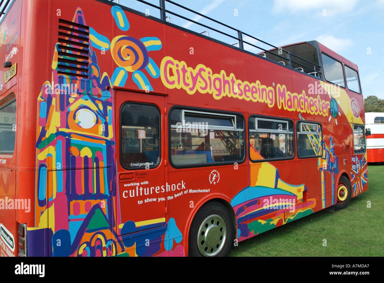 Manchester sightseeing tour bus Stock Photo - Alamy