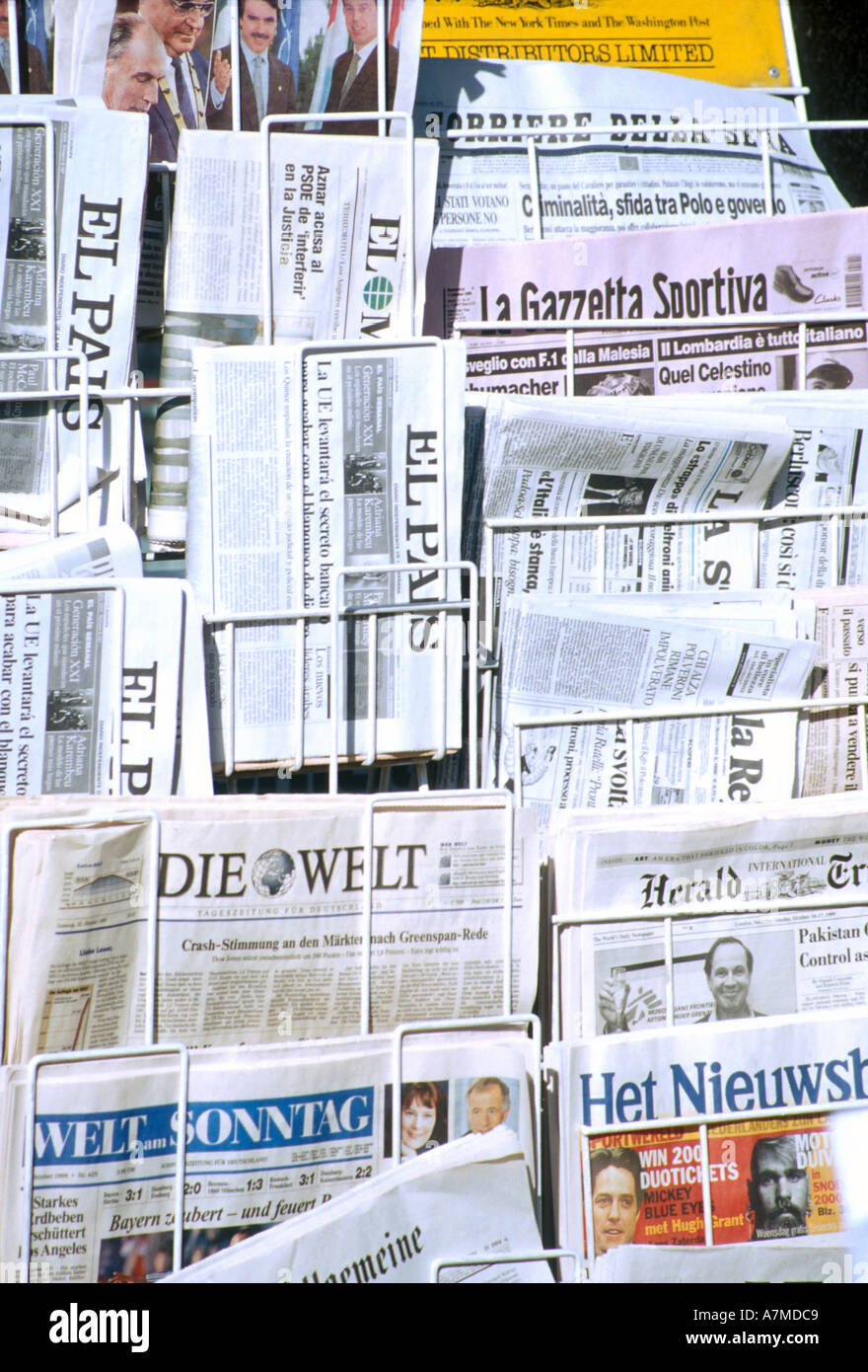 International newspapers at newstand Stock Photo - Alamy